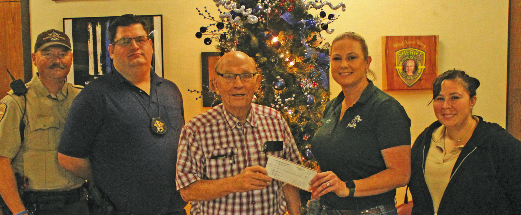 St. James Men’s Club Donates to Deputy Santa | The Fayette County Record