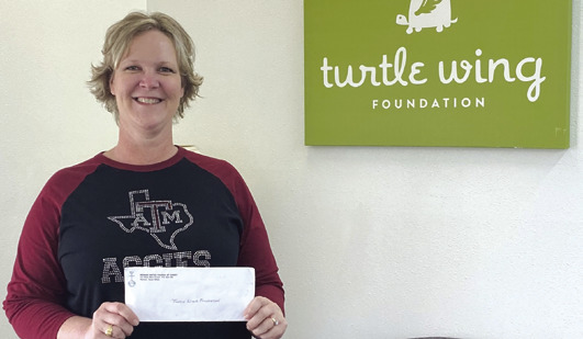 Turtle Wing Receives Donation | The Fayette County Record
