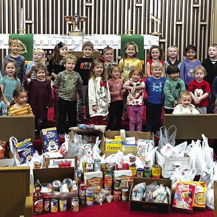 Mt. Calvary Kids Donate to AMEN Food Pantry | The Fayette County Record