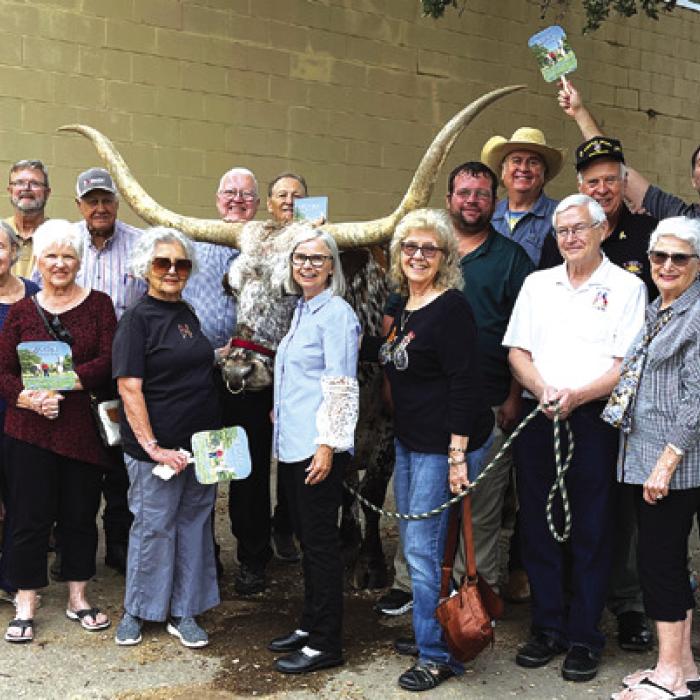 Birthday Crowd Around the Longhorn | The Fayette County Record